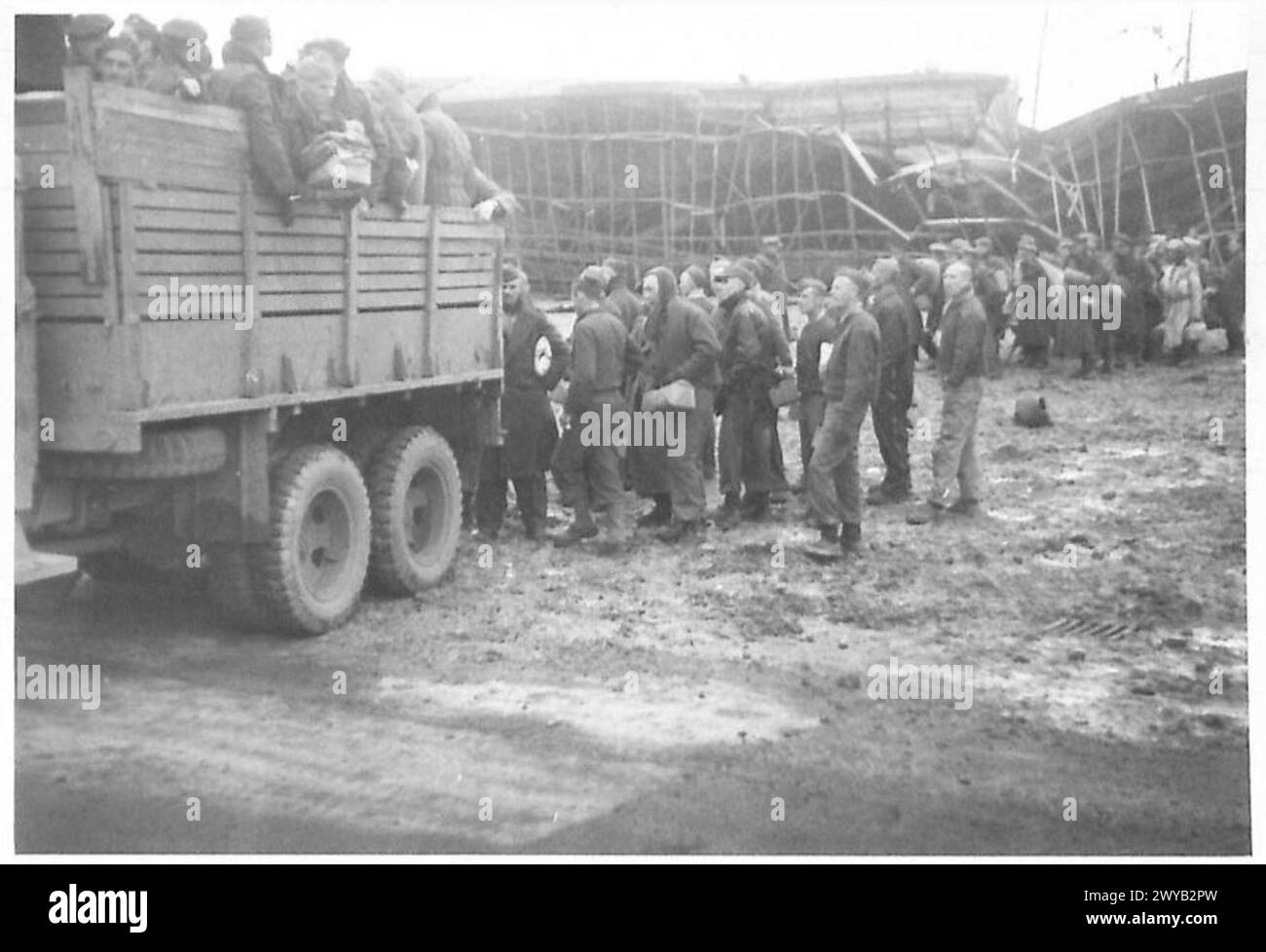 British POWs from Oflag 12B await air transport to England at Geiesen ...