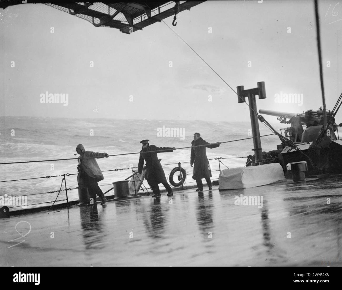 ON BOARD THE AIRCRAFT CARRIER HMS ARGUS. 1940. - Two Royal Marines and ...