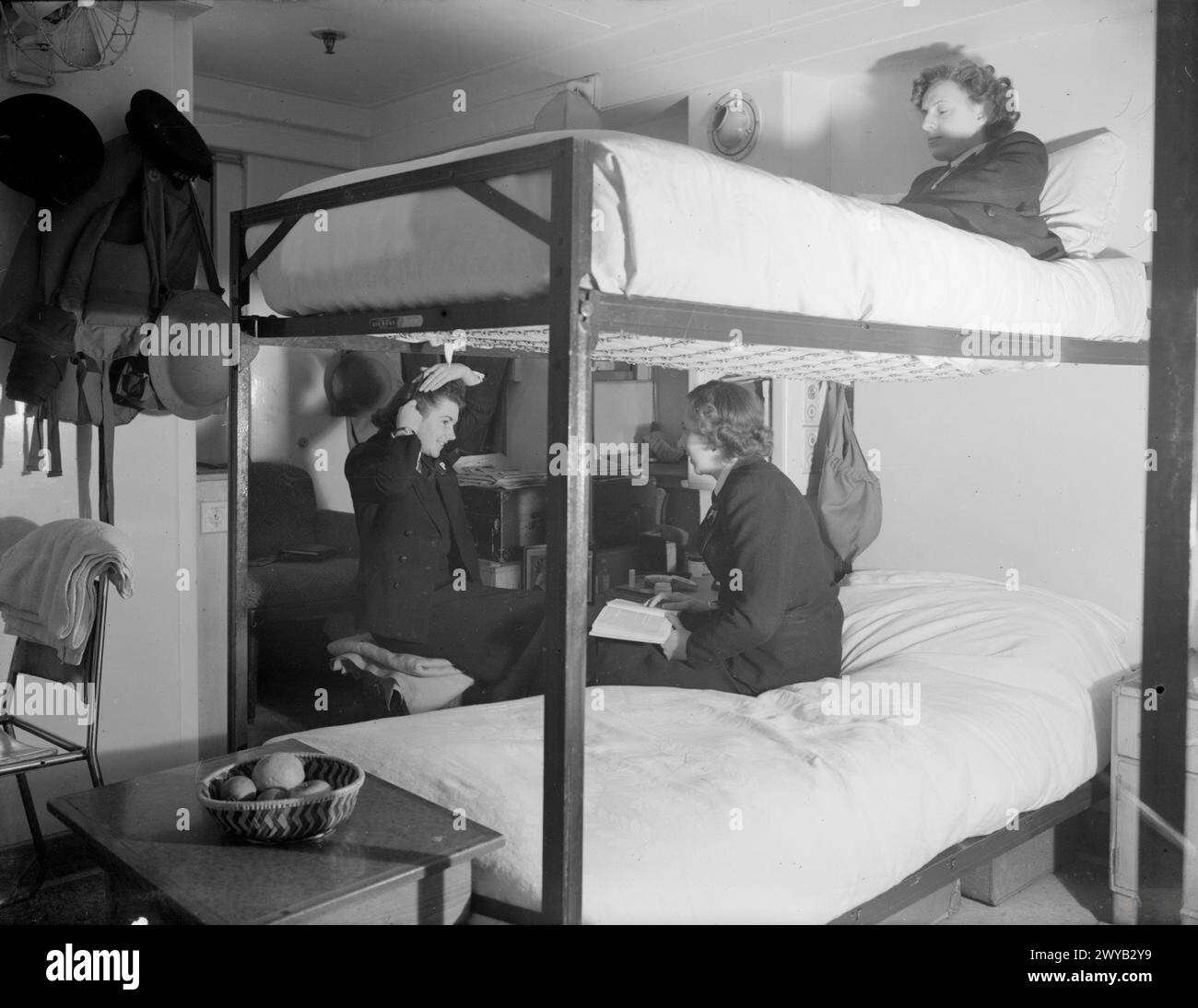 The Queen Mary, painted in grey and white for wartime service, prepares ...