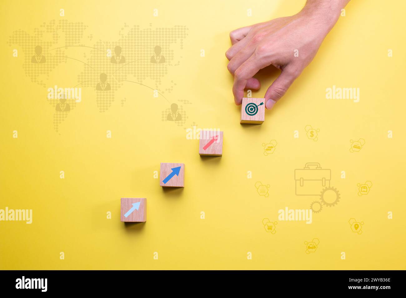 man's hand accommodates dice showing the concept of achieving ...