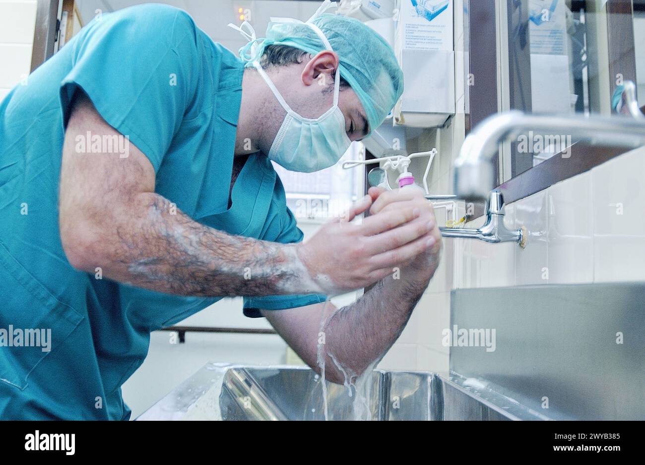 Surgeon washing hands at otorhinolaryngology operating room of hospital ...