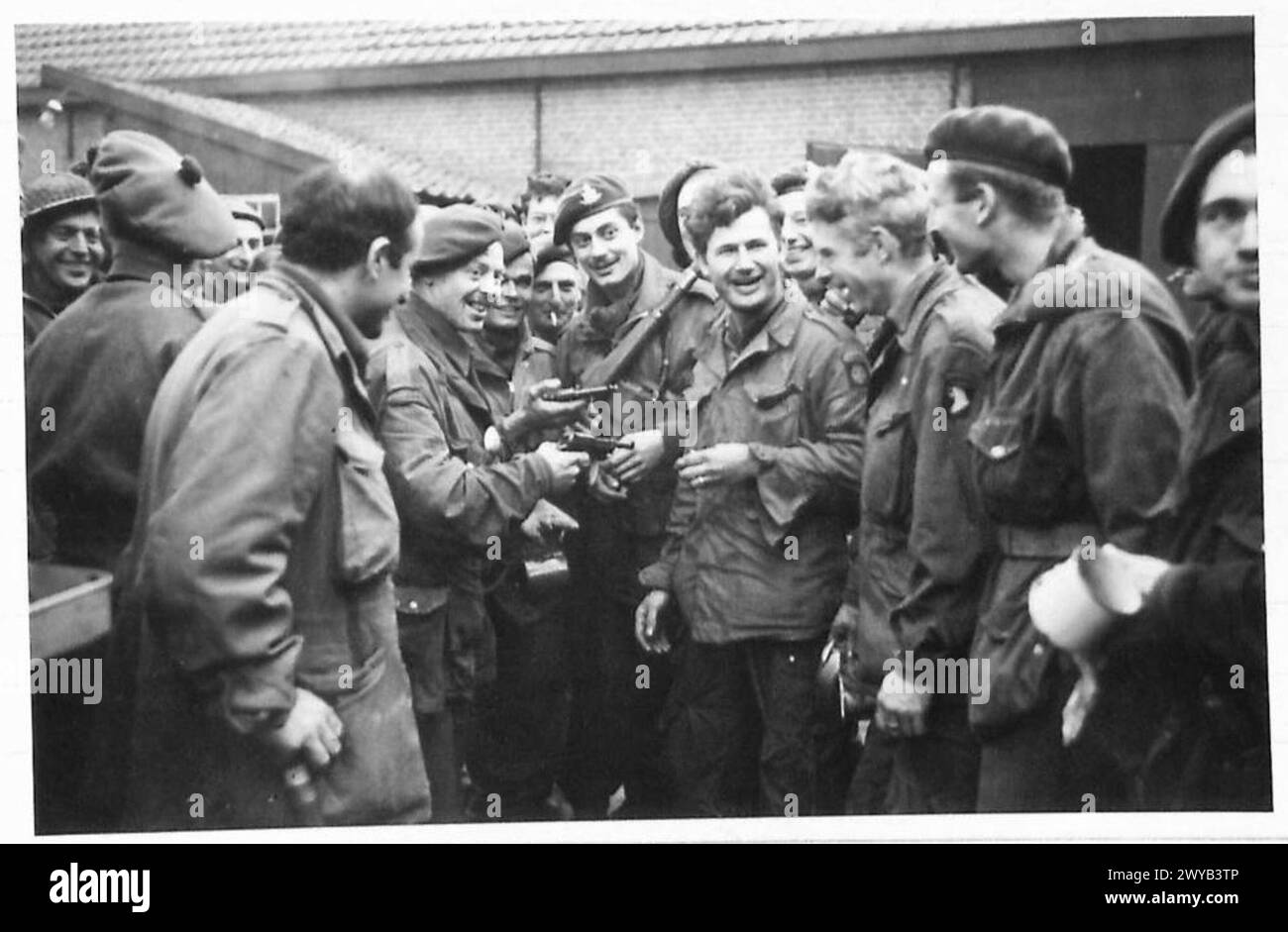 51 DIV ENTER BORSTAL - Original wartime caption: British and American ...