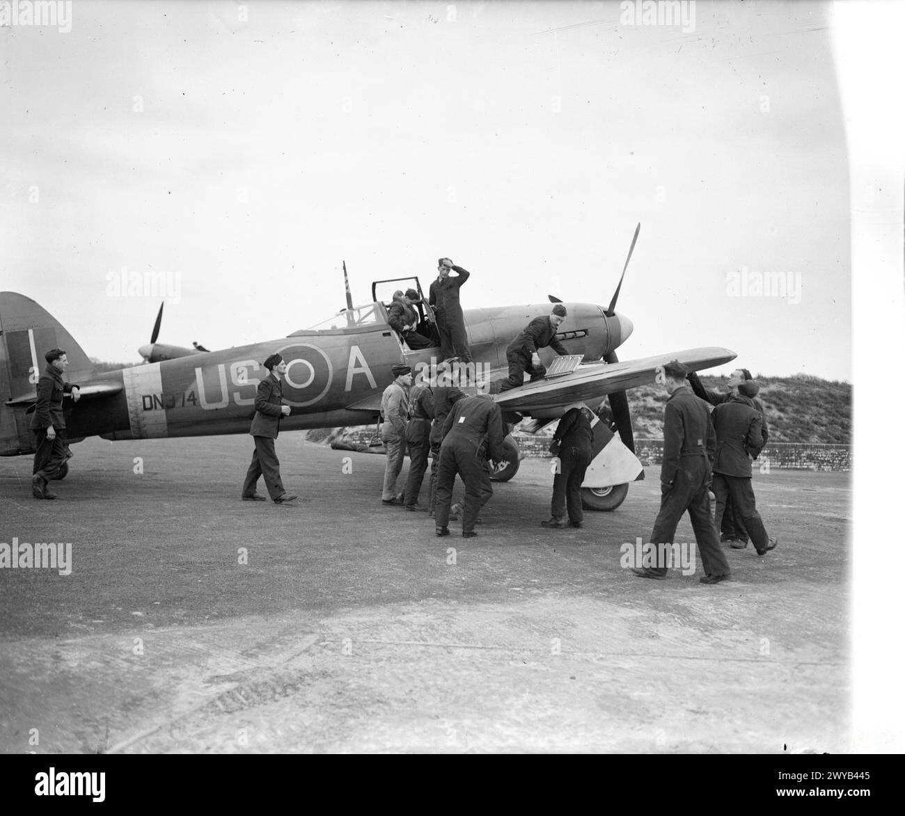 Ground crew of No. 56 Squadron RAF prepare Hawker Typhoon Mark IB DN374 ...