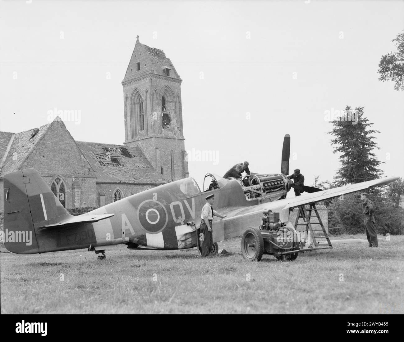 Members of a Royal Air Force Repair and Salvage Unit attend to a North ...