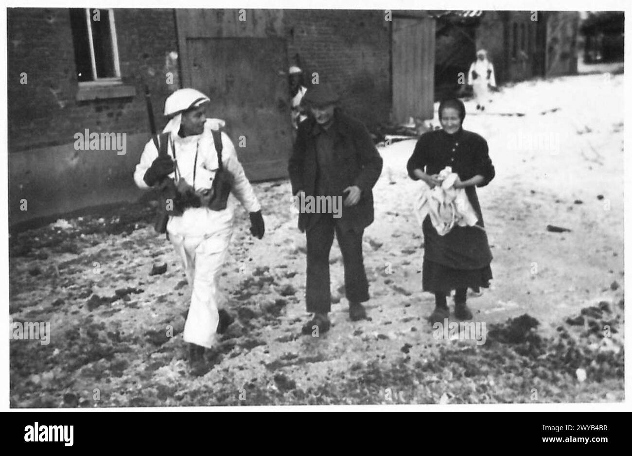 12 CORPS ATTACK - Original wartime caption: Two German civilians who ...