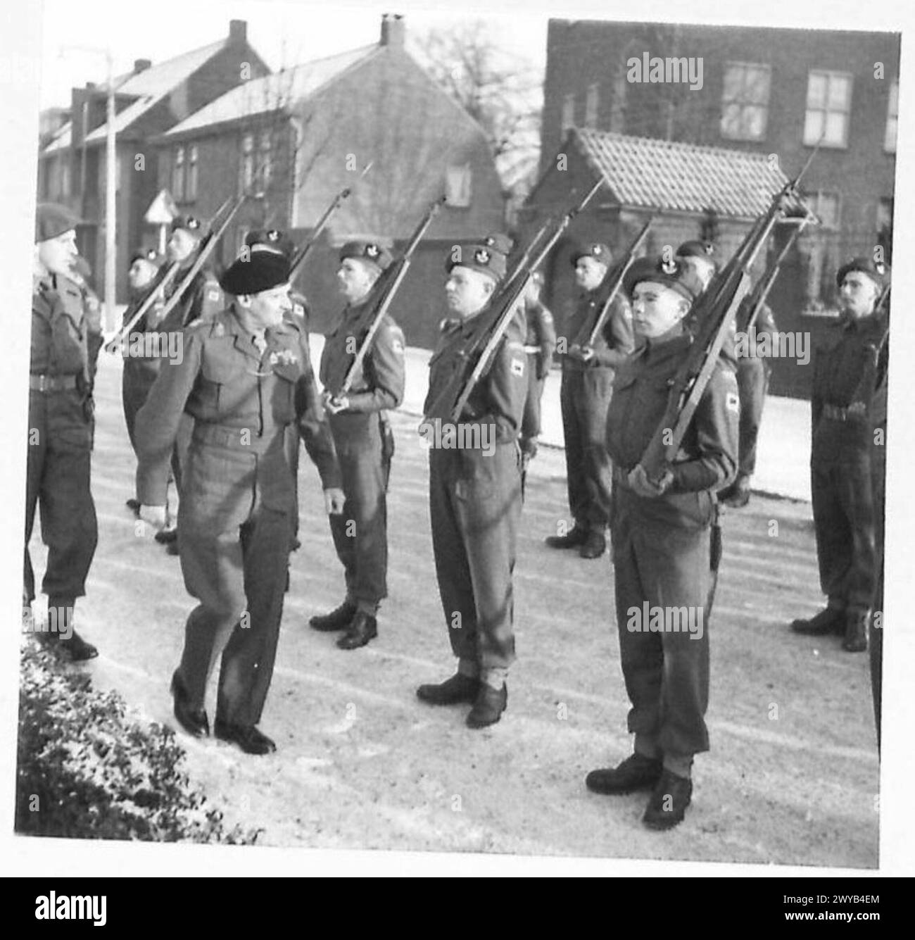 11th ARMOURED DIV INVESTITURE - Original wartime caption: The C-in-C ...