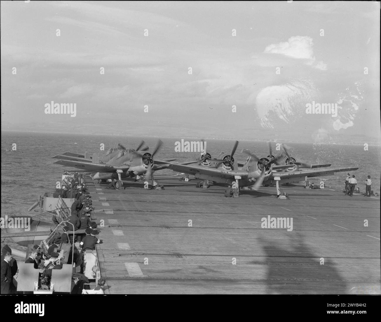 Grumman Hellcat aircraft prepare for operations on the flight deck of ...