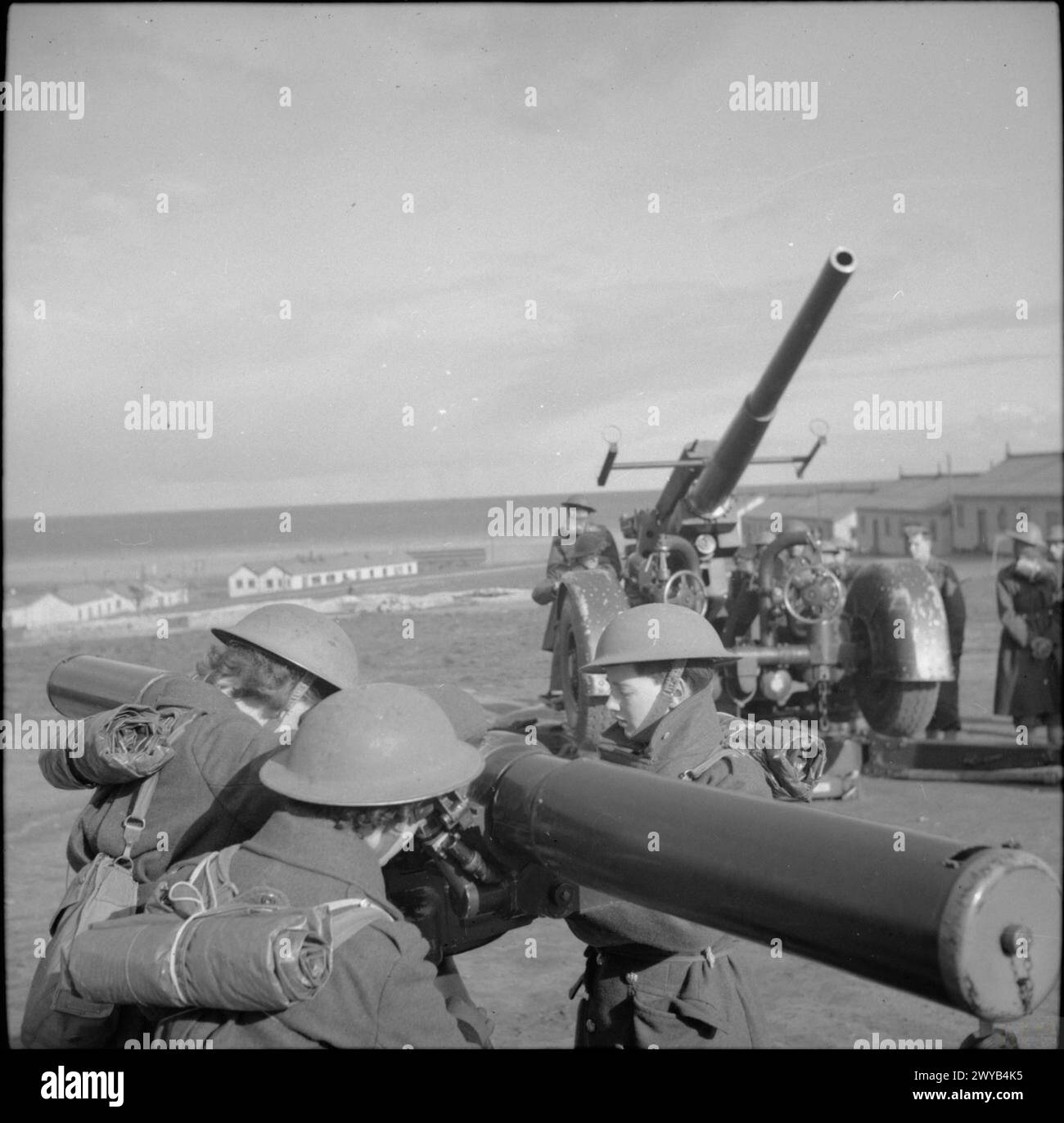 ATS women operate a rangefinder at the anti-aircraft training camp in ...