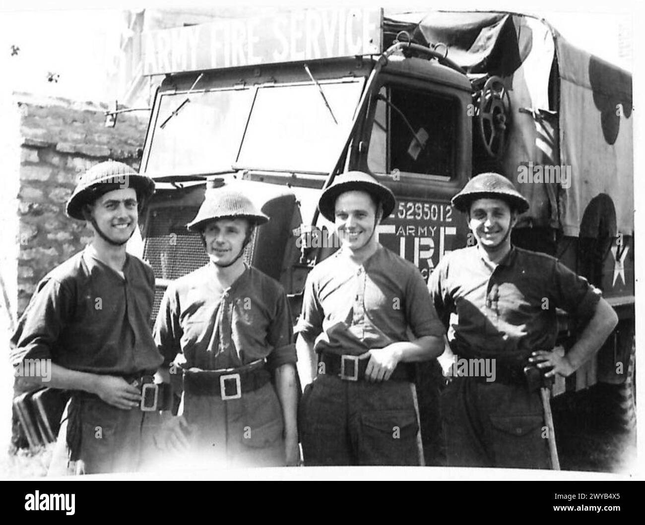 THE ARMY FIRE SERVICE - Original wartime caption: L to R Ptes. J.S ...