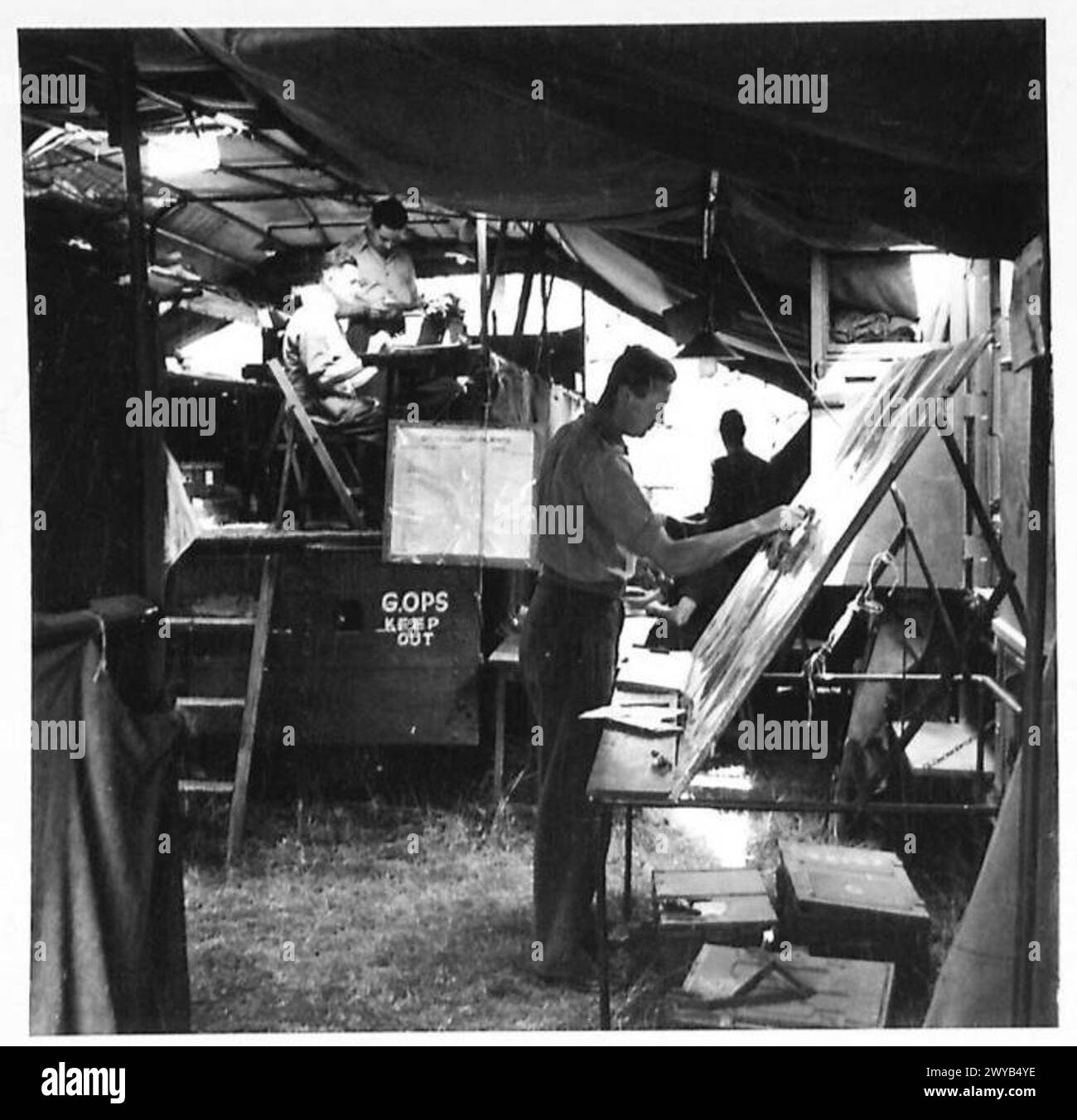 A CORPS HQ. IN FRANCE - Original wartime caption: Interior of G Ops ...