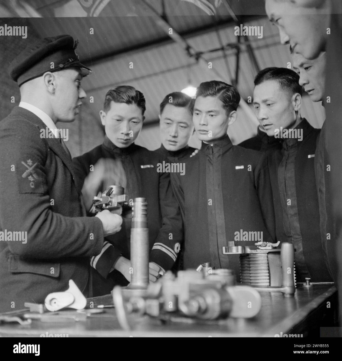 Chinese naval officers receive instruction at Chatham Gunnery School in ...
