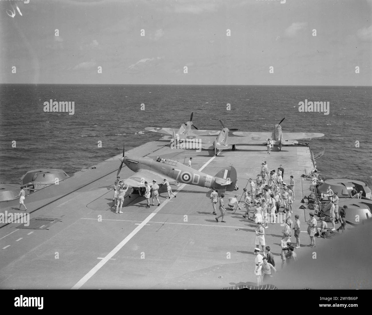 MALTA CONVOY. 10-12 AUGUST 1942. - A Hawker Hurricane being ranged on ...