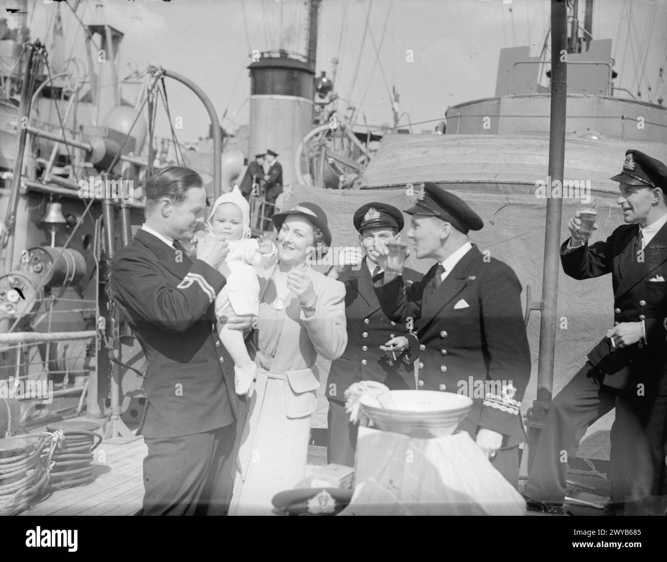 NAVAL CHRISTENING ON BOARD A MINESWEEPER. 31 MARCH 1944, PORTSMOUTH, ON ...