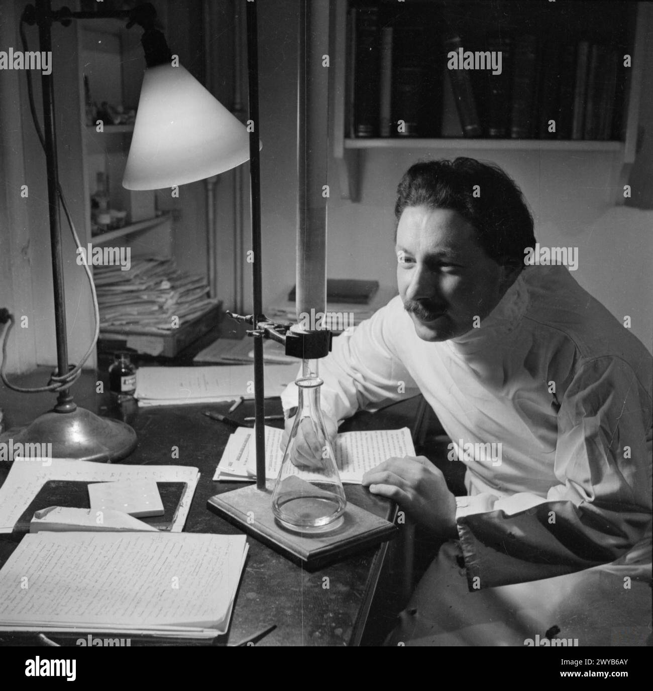 Dr Ernest Chain performs an experiment on penicillin at the School of ...