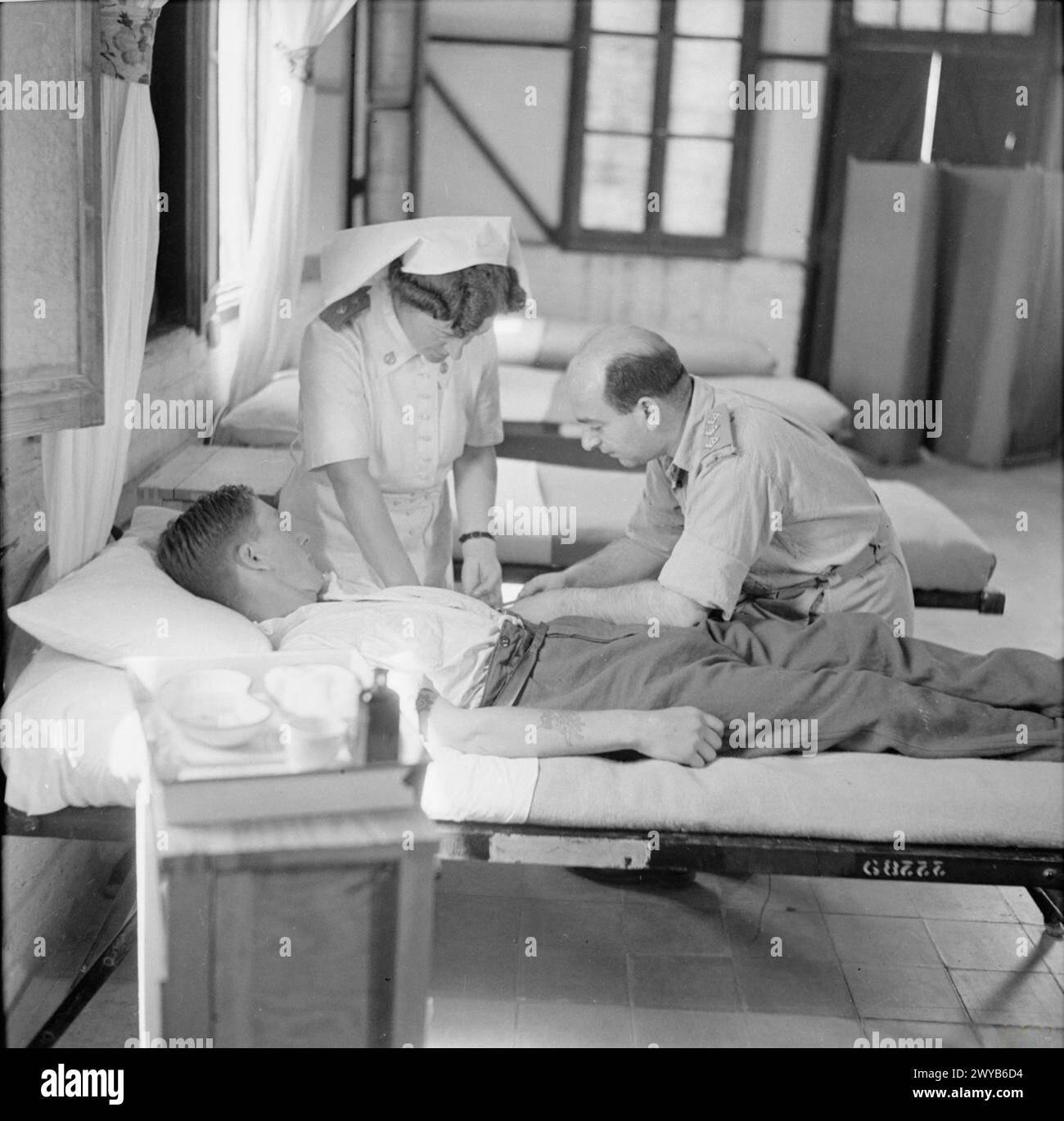 A patient receives a pentothal injection at No. 41 General Hospital ...