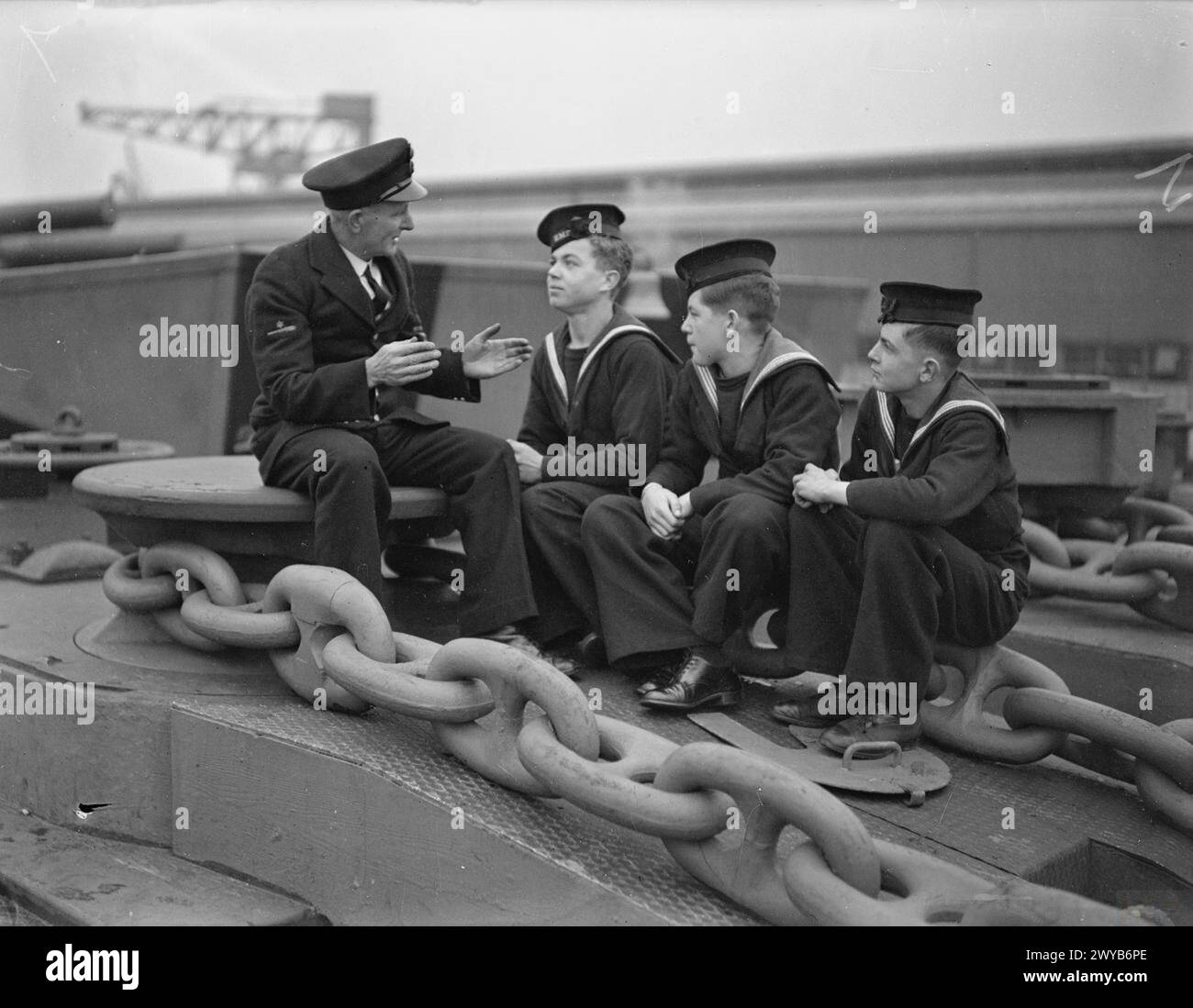 Sixteen-year-old crew members of HMS King George V listen to Petty ...