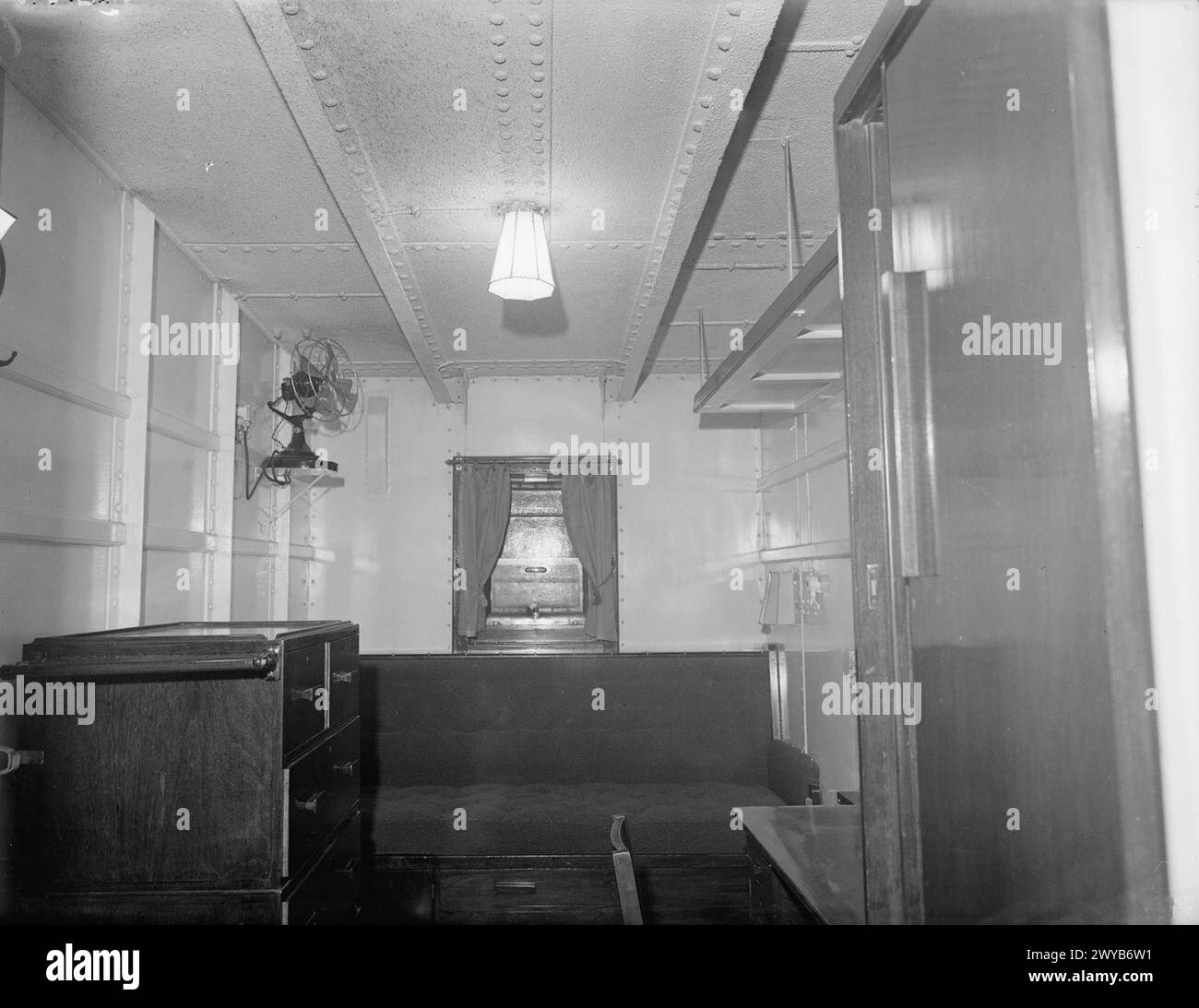 Interior of HMS Forth, a Royal Navy depot ship, showing the Submarine Commanding Officer's cabin ...