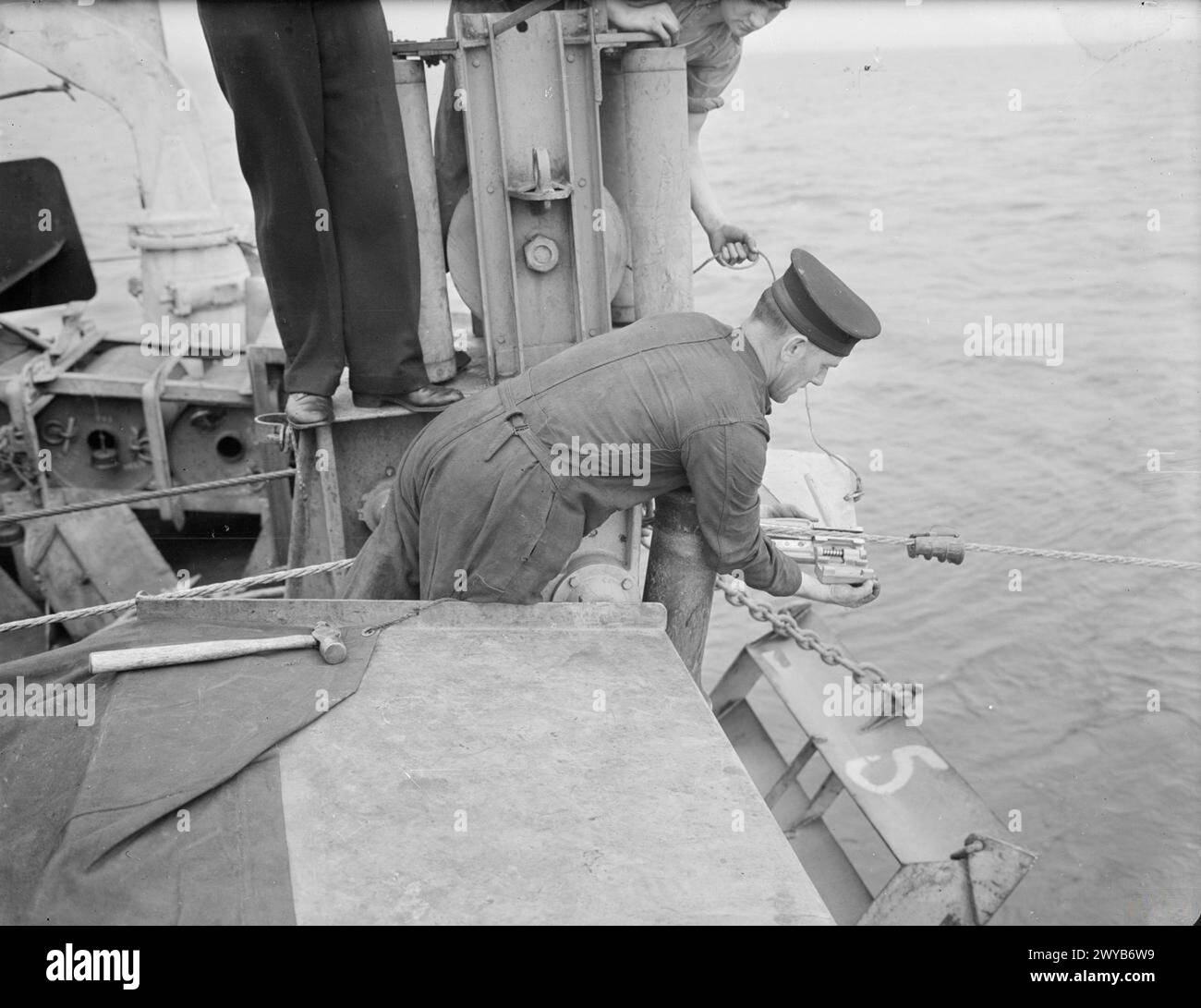 MINESWEEPERS HARD AT WORK TO MAKE SEAS SAFE AGAIN. JULY 1945, ON BOARD ...