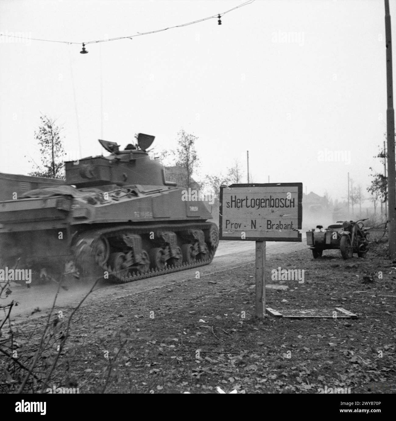 A British Army Sherman tank advances into Hertogenbosch in North-West ...
