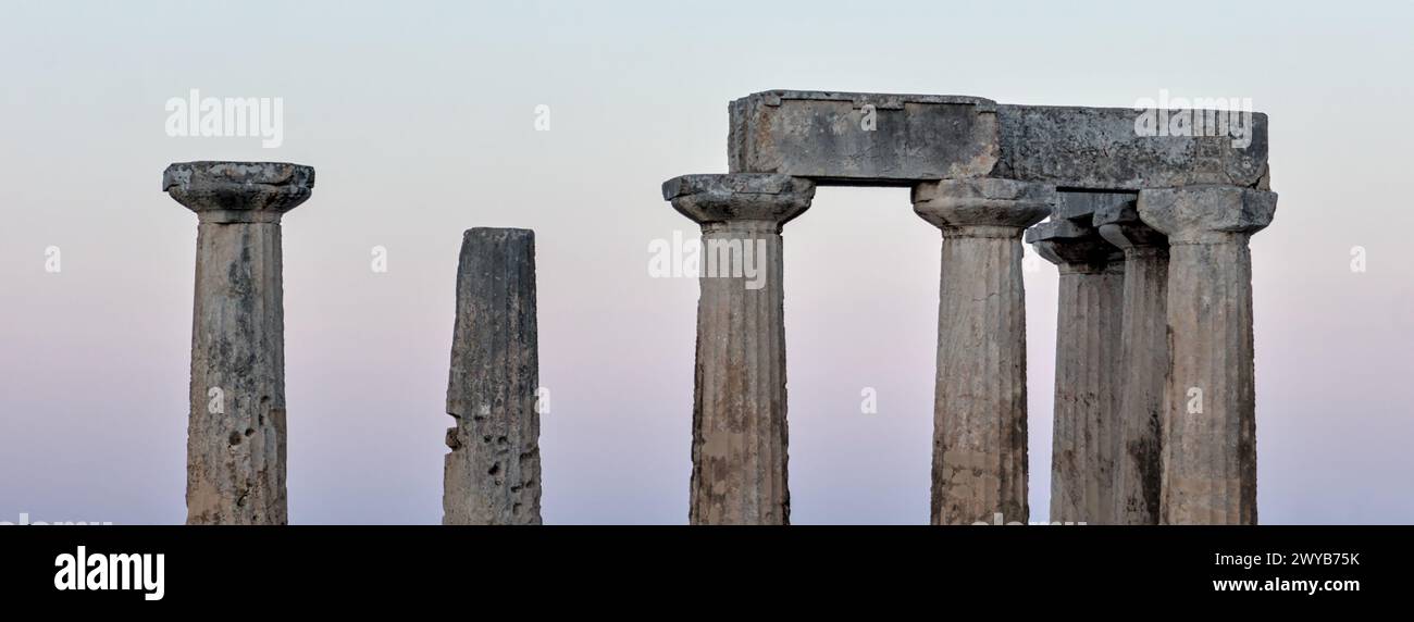 Temple of Apollo ruins in Ancient Corinth, Greece. Details of columns, pillars, doric ...