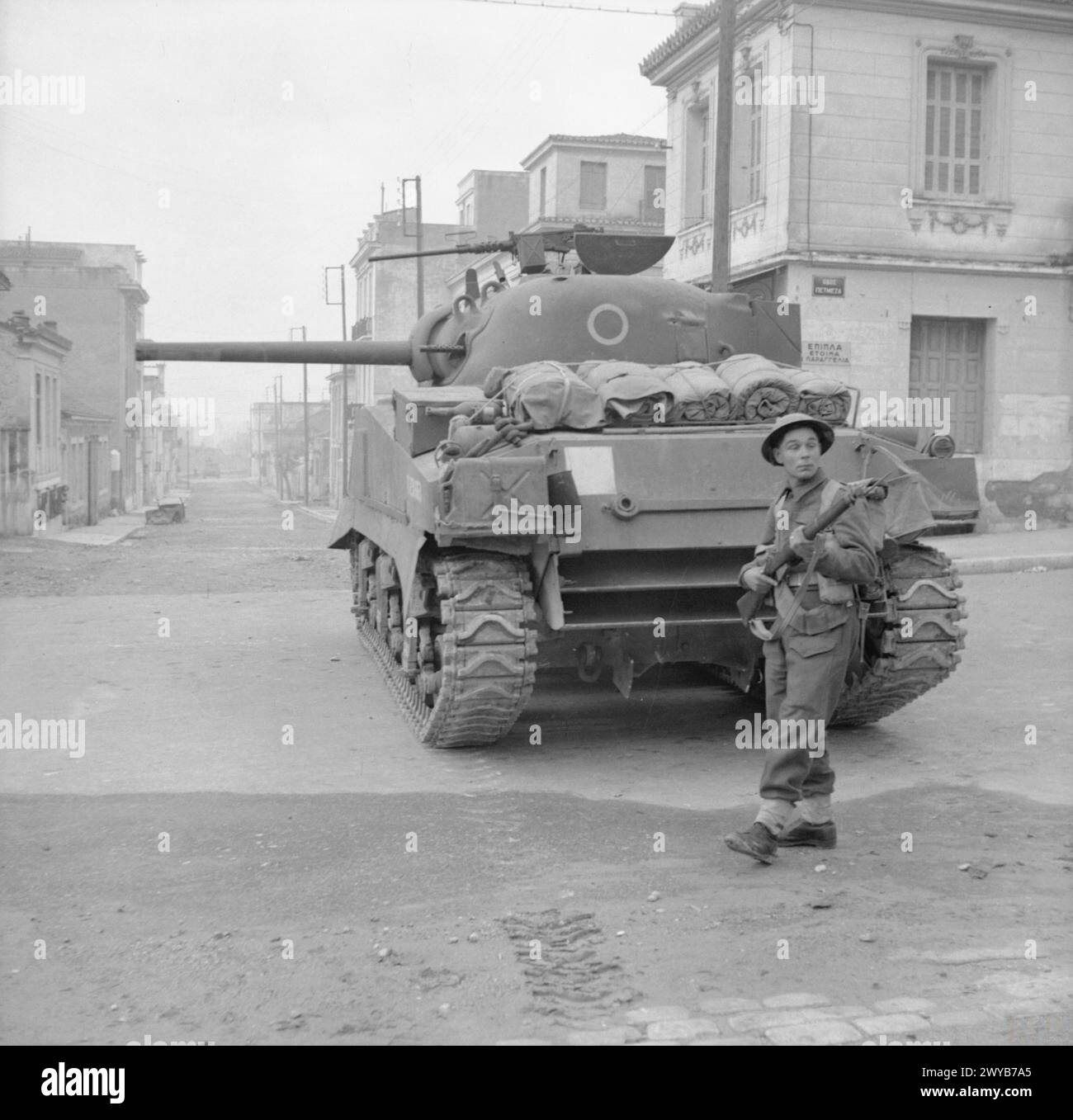 THE BRITISH ARMY IN GREECE 1944 - A rifleman acts as 'tail-end Charlie ...