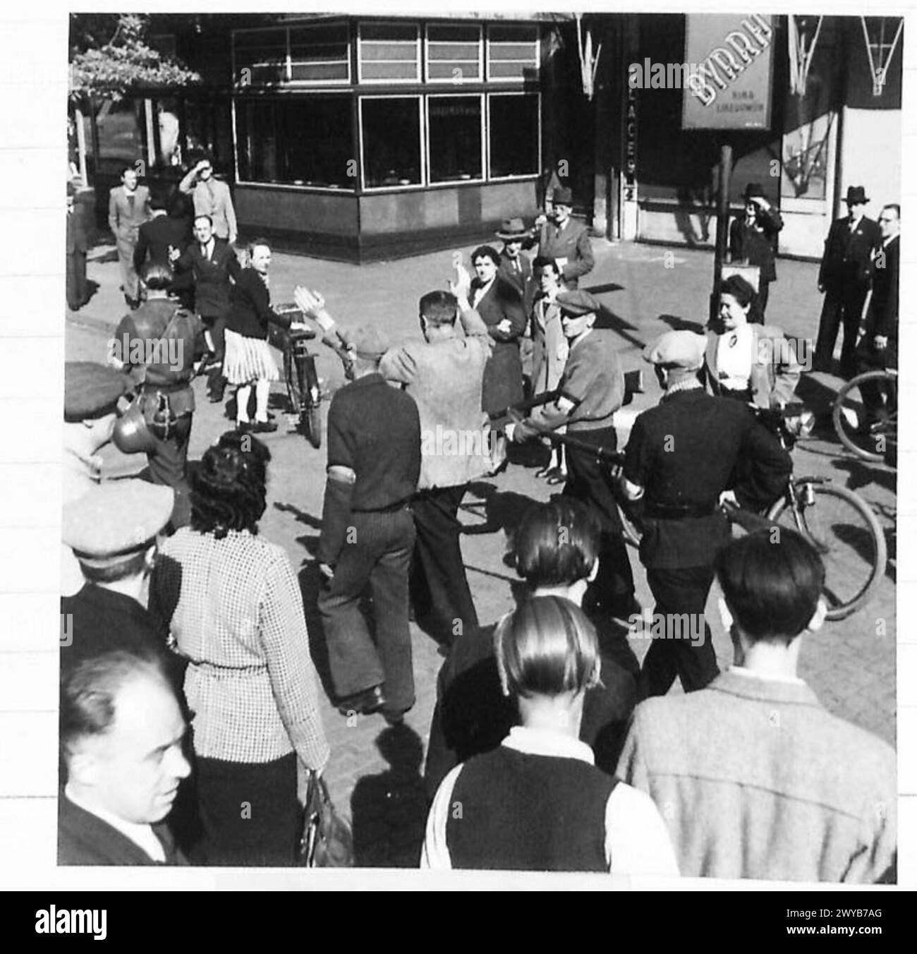 COLLABORATORS IN ANTWERP - Original wartime caption: A collaborator ...