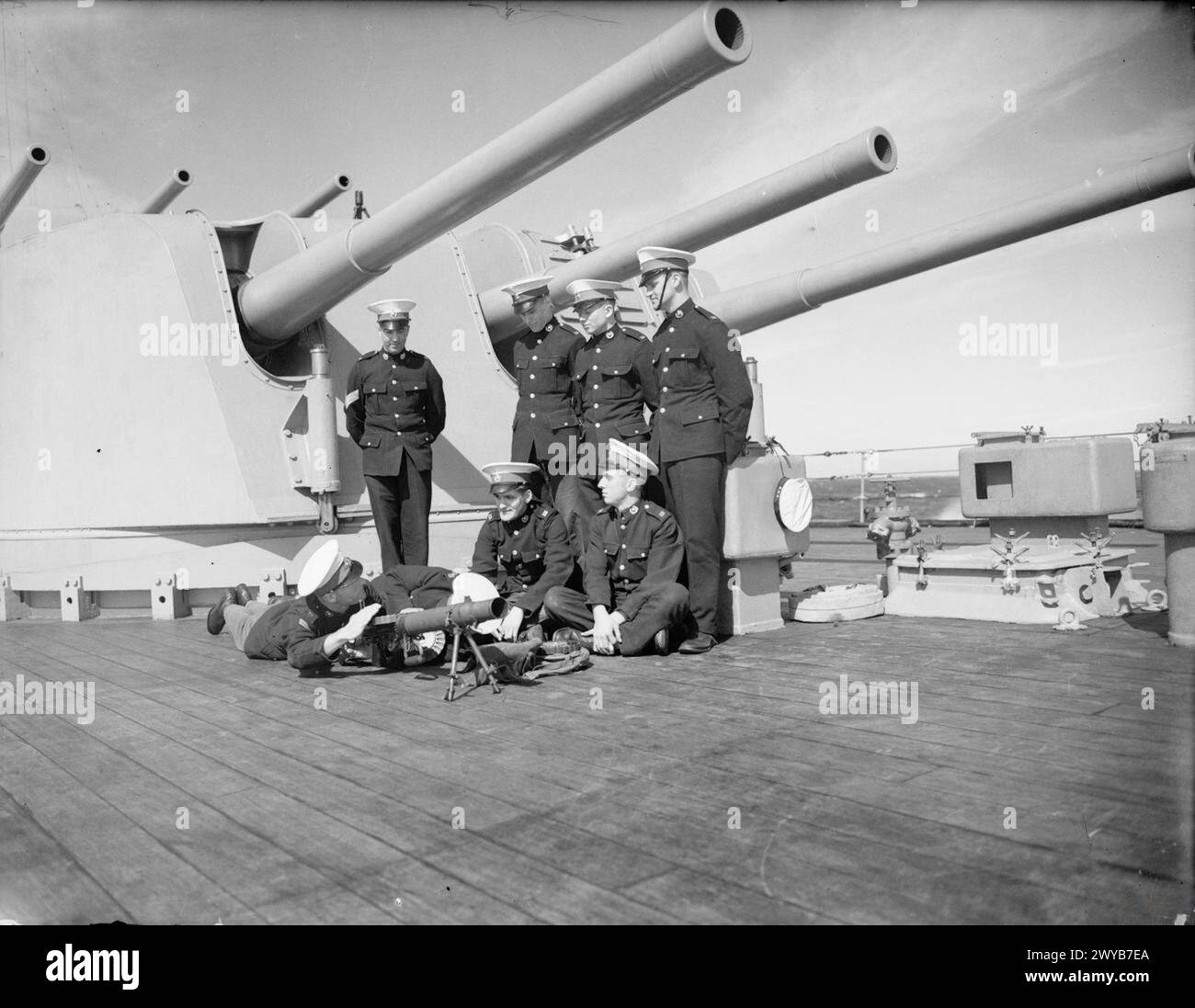 Marines aboard HMS Sheffield in April 1941 are pictured receiving Lewis ...