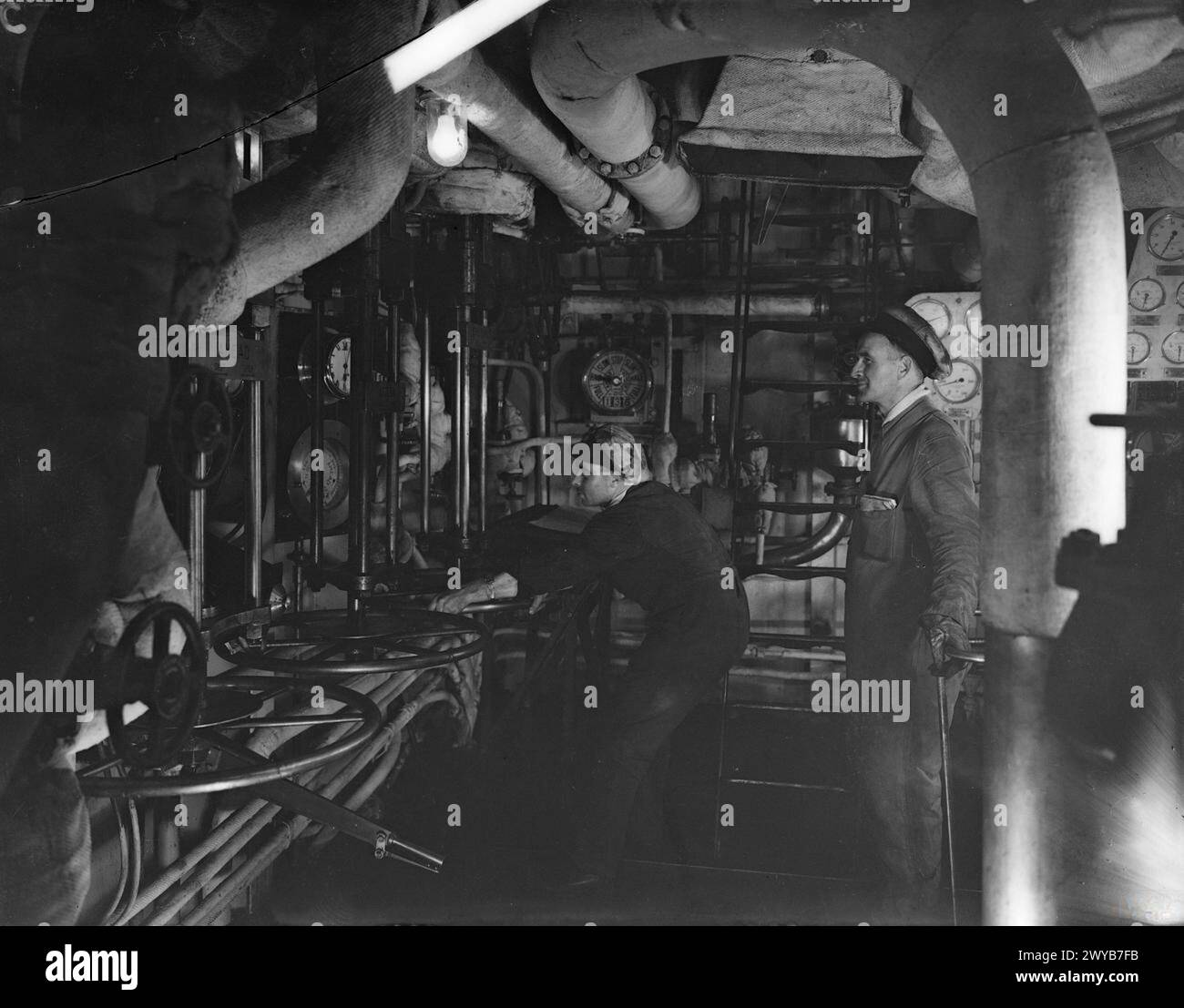 HMS HOWE. AUGUST 1942. - In one of the engine rooms, an ERA (engine ...