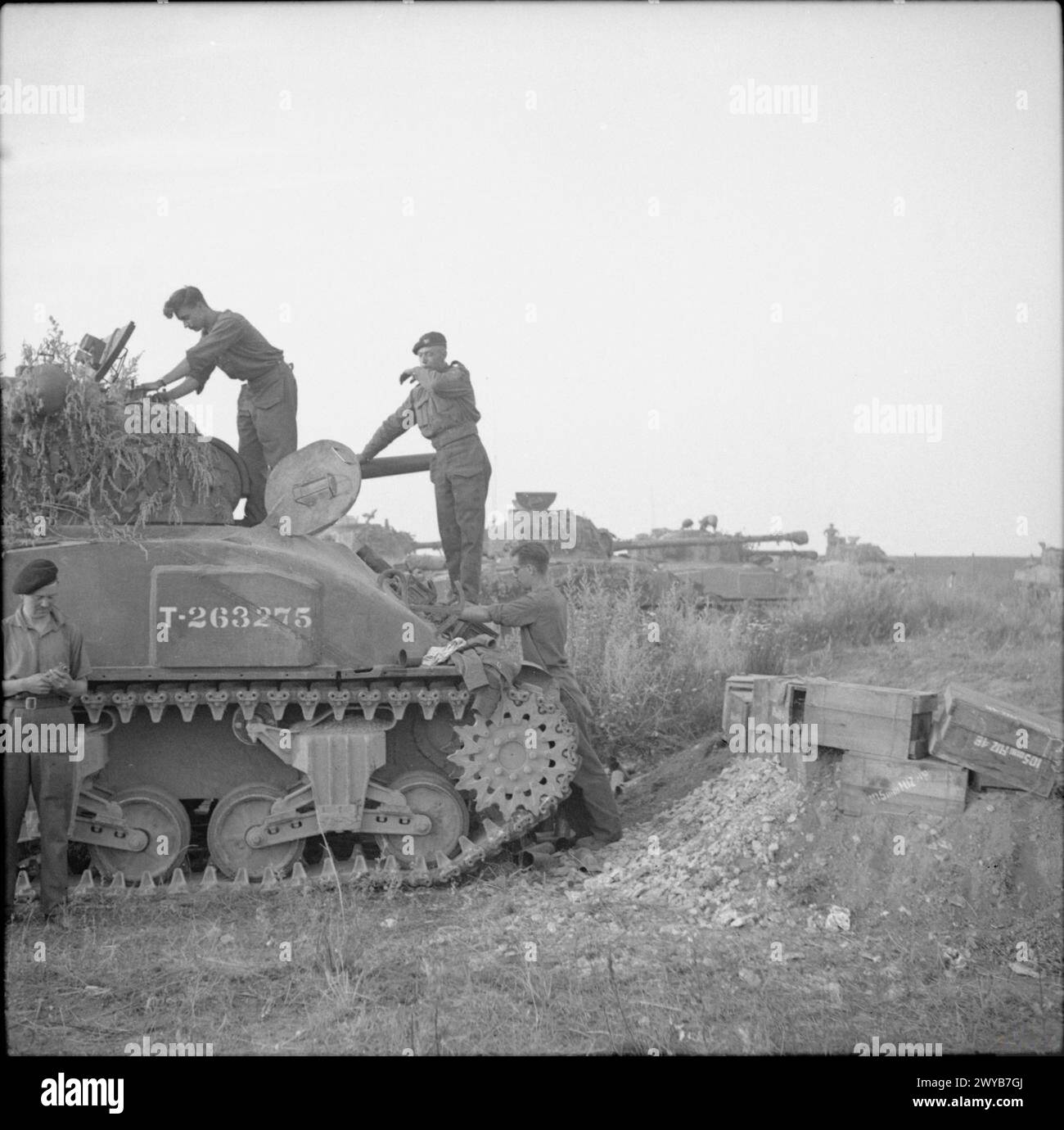 THE BRITISH ARMY IN NORMANDY 1944 - Sherman tank crews preparing for ...