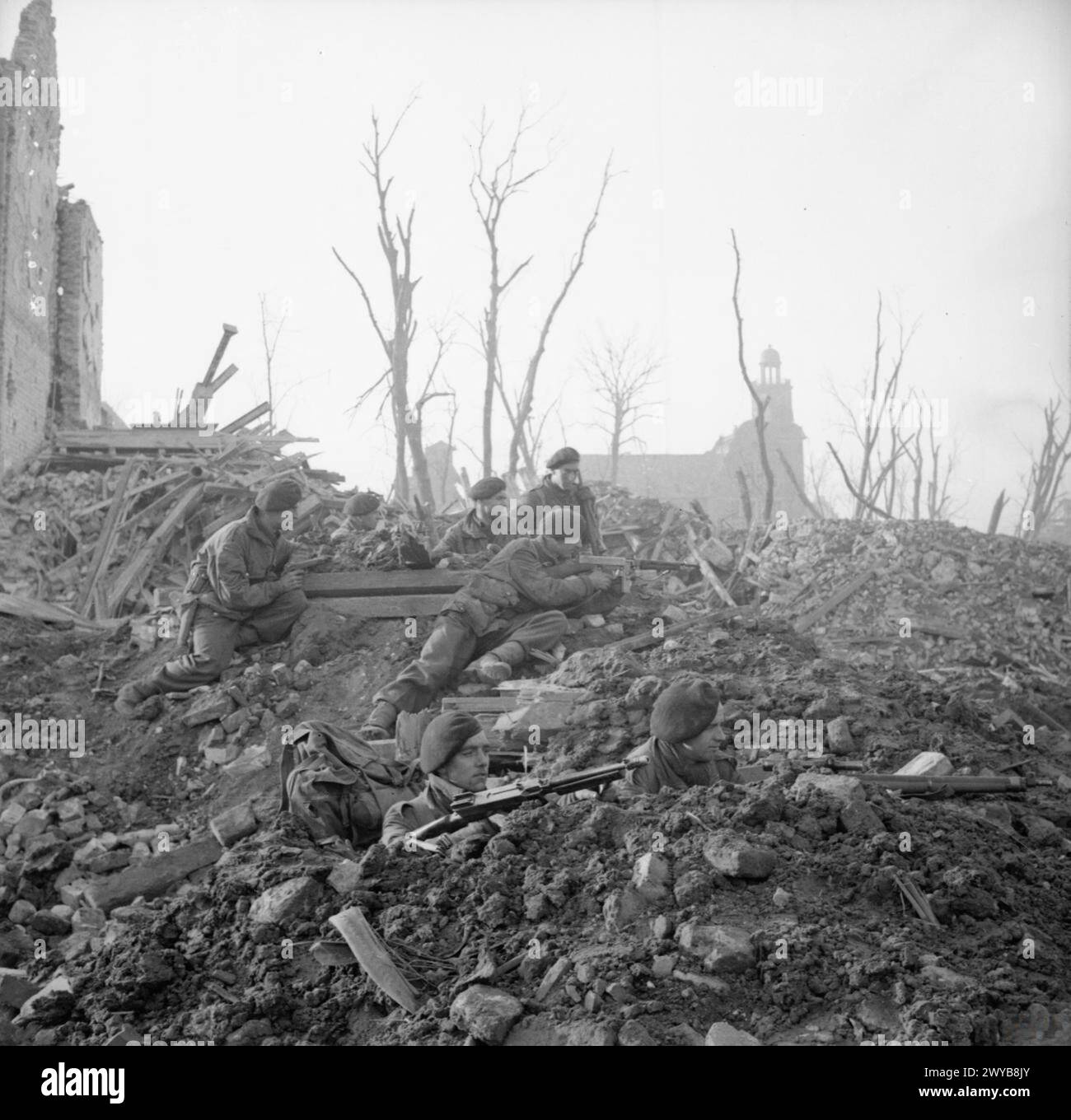 6th Commando personnel of the British Army occupy a defensive position ...