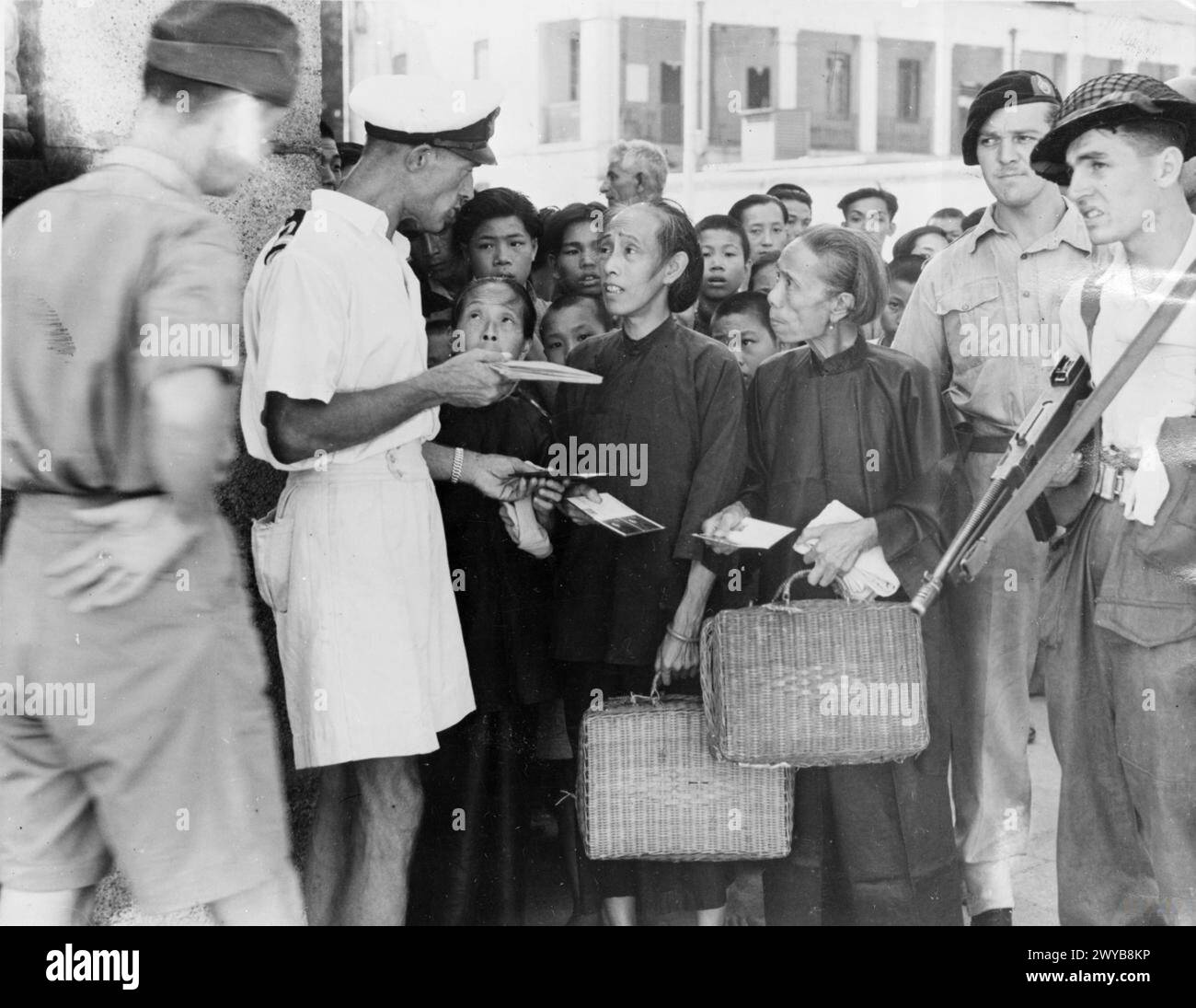 Chinese workers in Hong Kong dockyard having passes checked following ...