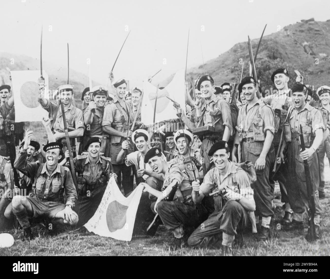 In September 1945, crew members of HMS Indomitable occupied the Kai Tak ...