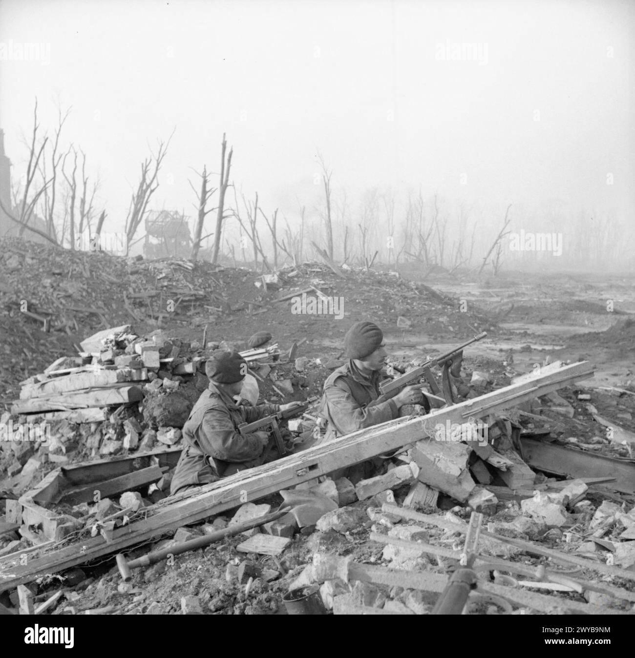 "6th Commando personnel hold a defensive position after capturing Wesel ...