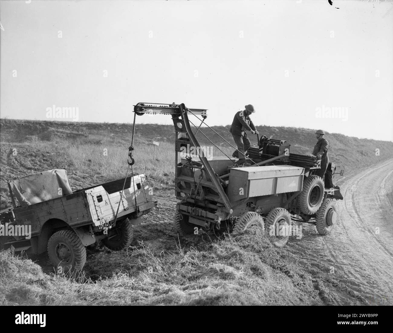 THE BRITISH ARMY IN FRANCE 1939-40 - A Morris 15cwt truck being winched ...
