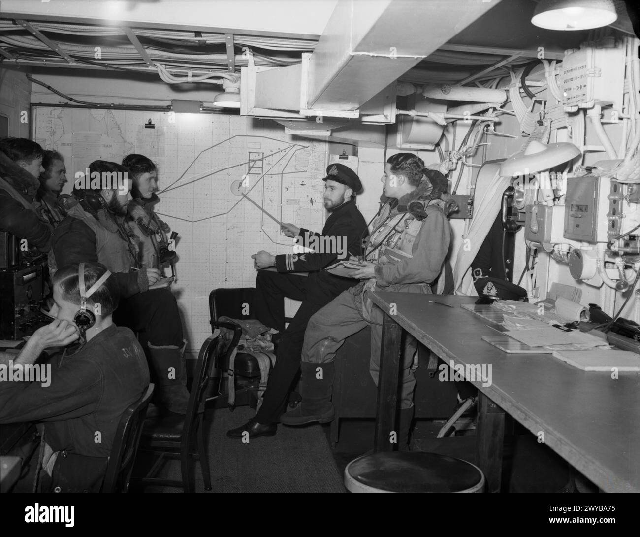 Acting Lieutenant Commander J M Glaser, RN, briefs crews in full flying ...