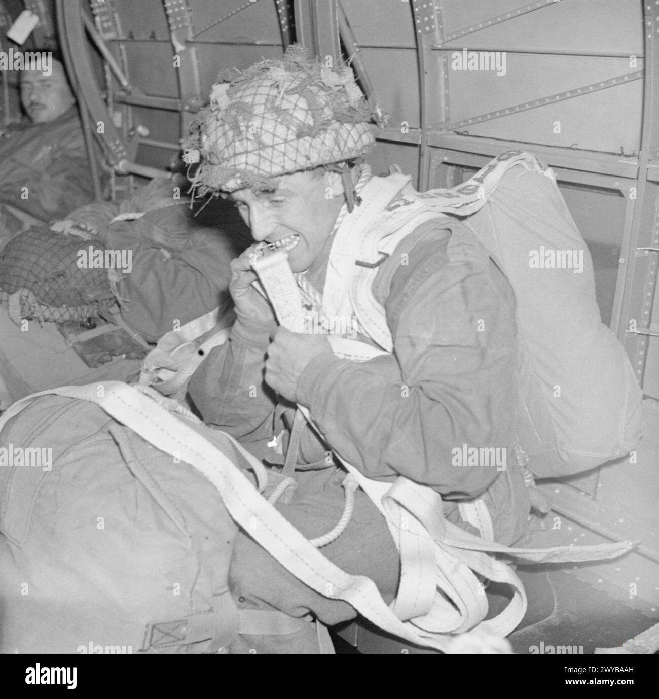BIG AIRBORNE EXERCISE - Original wartime caption: Final adjustment of ...