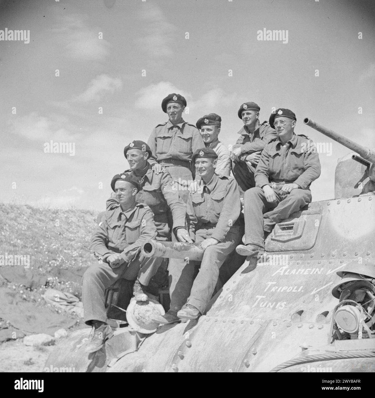 NEXT STOP-? - Tank men ready for the road. Note the inscriptions on the ...