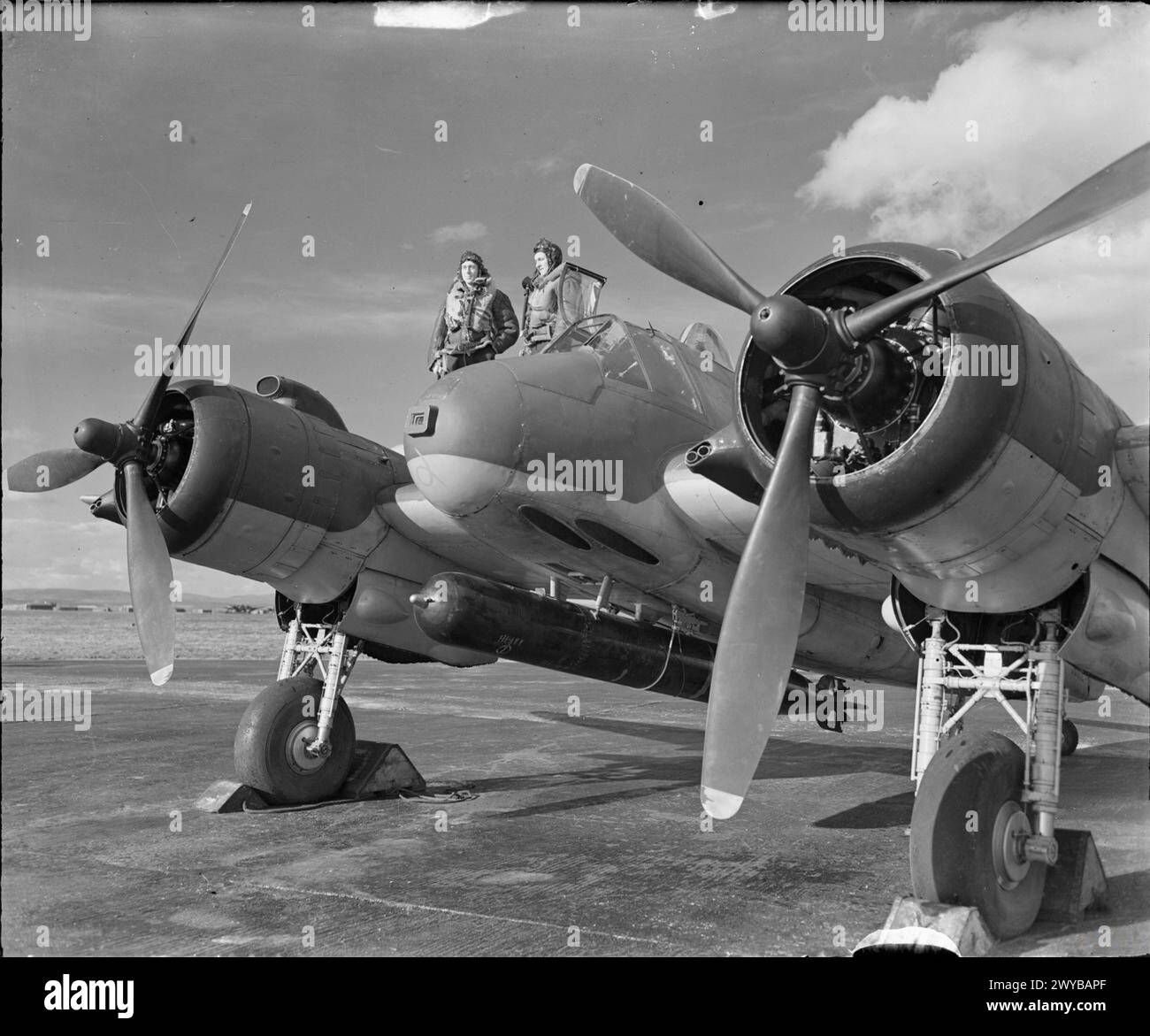 The crew of a Bristol Beaufighter Mark VIC (ITF) of No. 144 Squadron ...