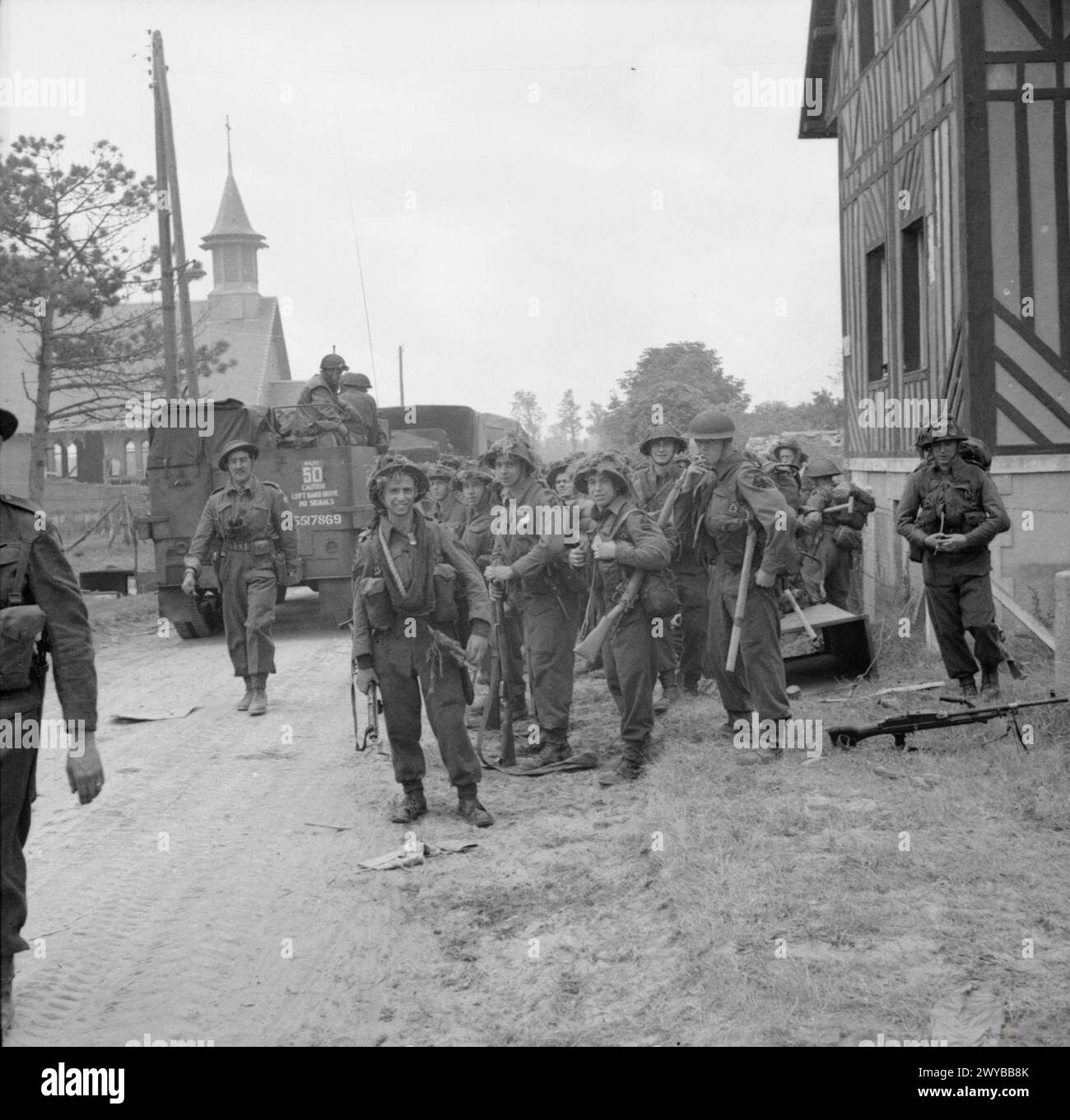 On 6 June 1944, troops of the British 3rd Division pause in La Brèche d ...
