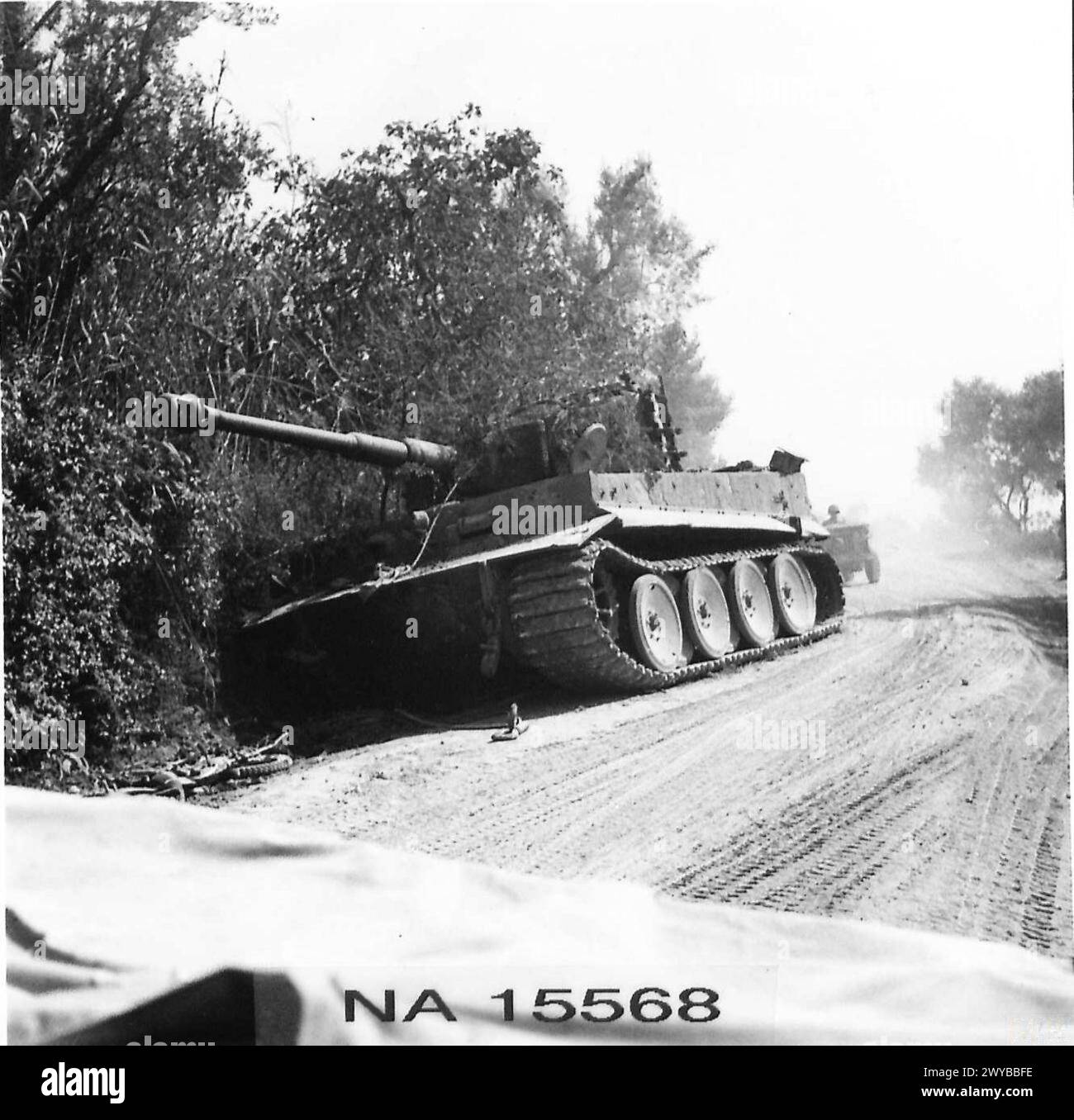 A destroyed and abandoned Mk VI Tiger tank was documented during Fifth ...