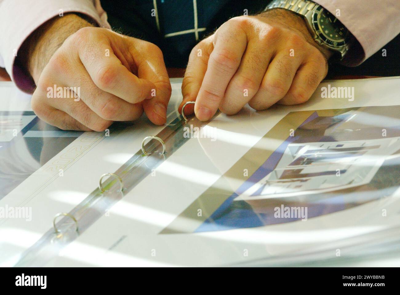 Hands closing book hi-res stock photography and images - Alamy