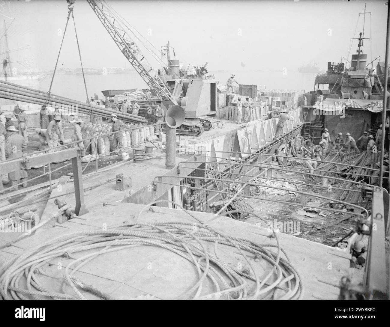 Between 17 and 26 February 1943, tank landing craft unloaded supplies ...