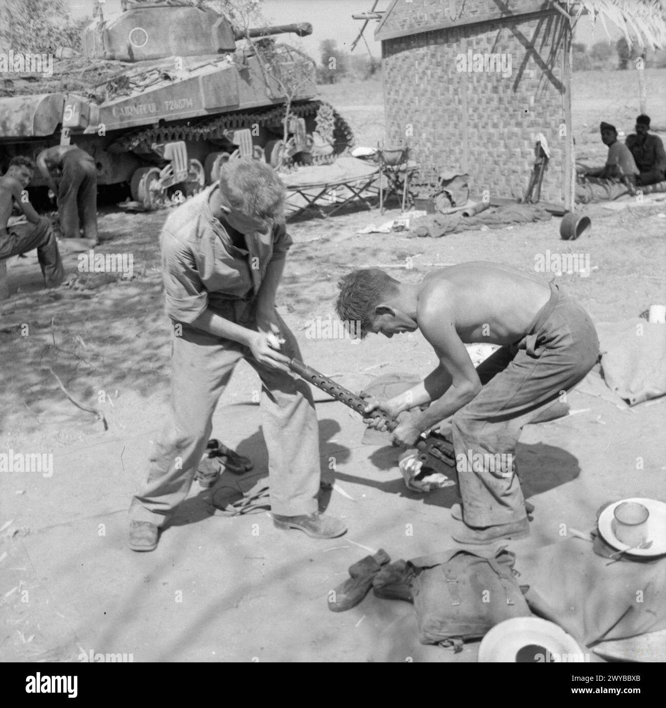 Two crew members of a Sherman tank from the 116th Regiment, Royal ...
