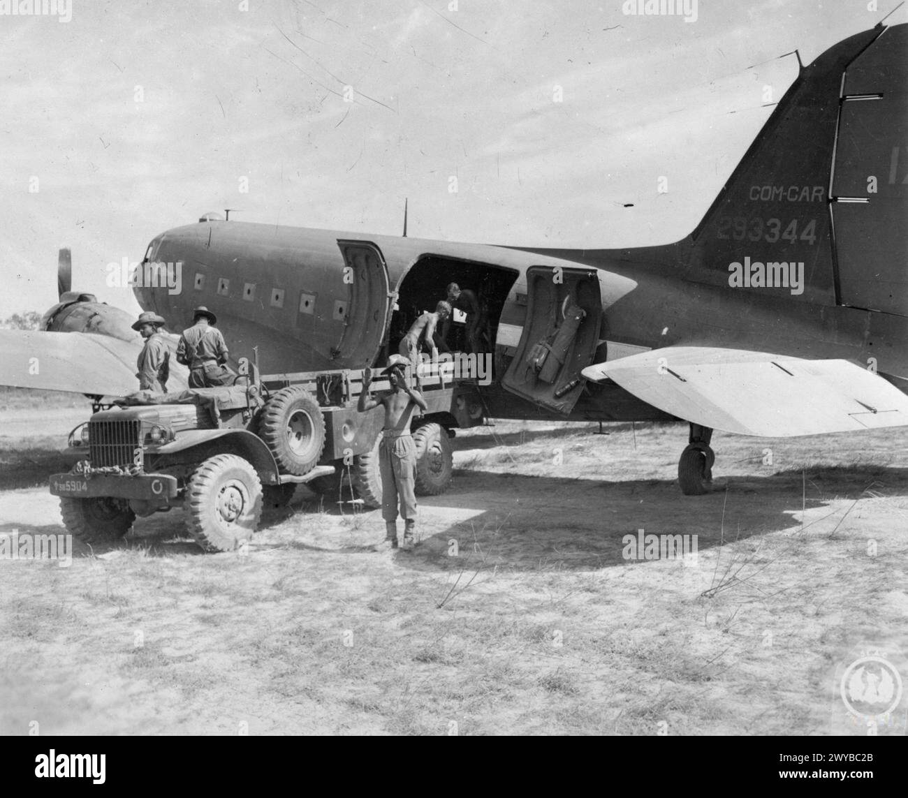 THE BRITISH ARMY IN BURMA 1944 - Royal Indian Army Service Corps troops unload an American C-47 ...