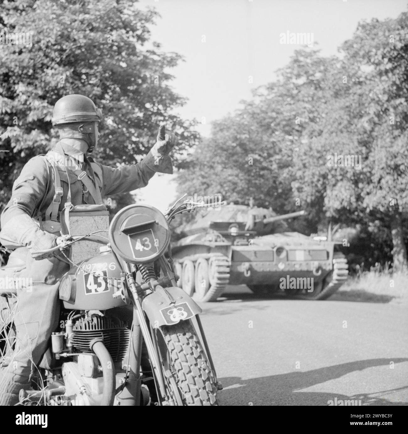 TANKS HAVE SPECIAL POLICE - Police guiding a Covenanter tank into the ...