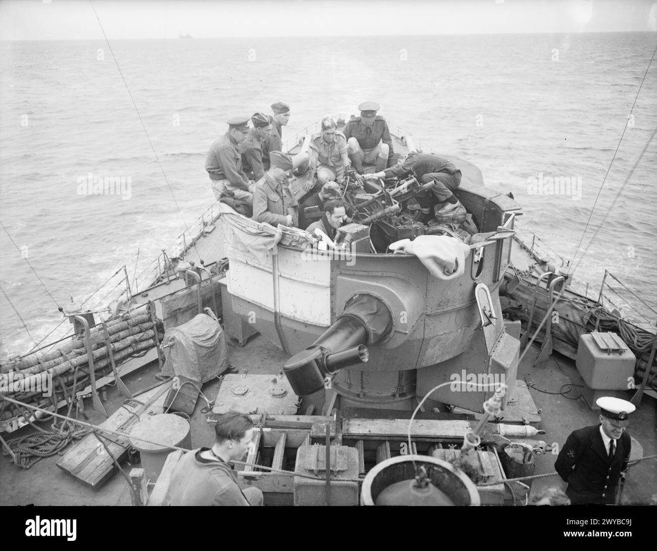 ON BOARD THE CRUISER HMS SHEFFIELD. MAY 1941, AT SEA. - Some Army Officers and men on board HMS ...