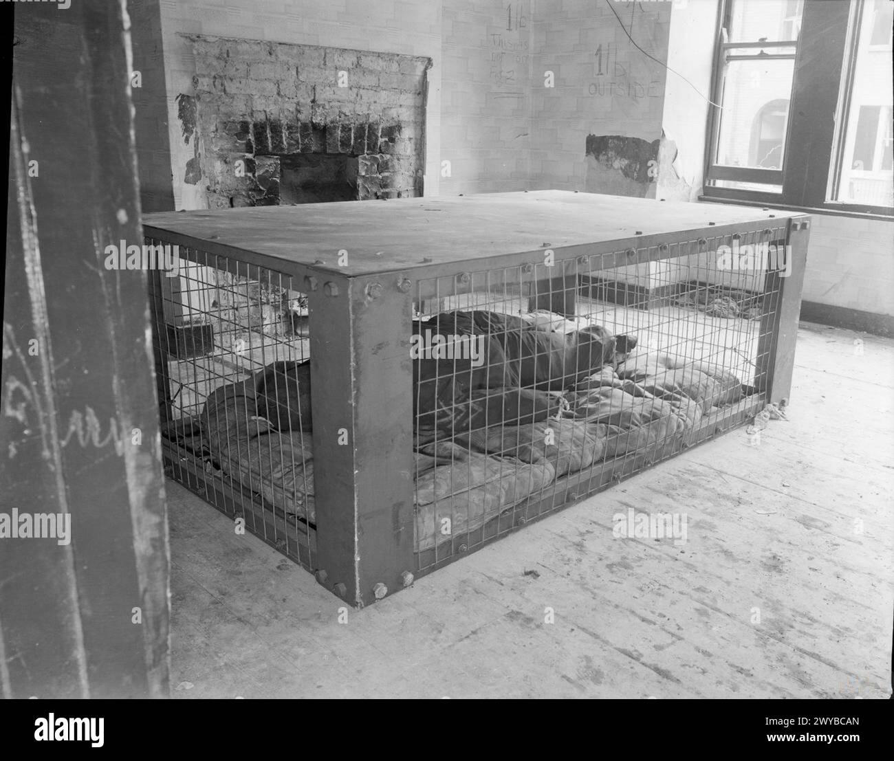 In 1941 in Britain, a Morrison indoor shelter was tested by placing a ...