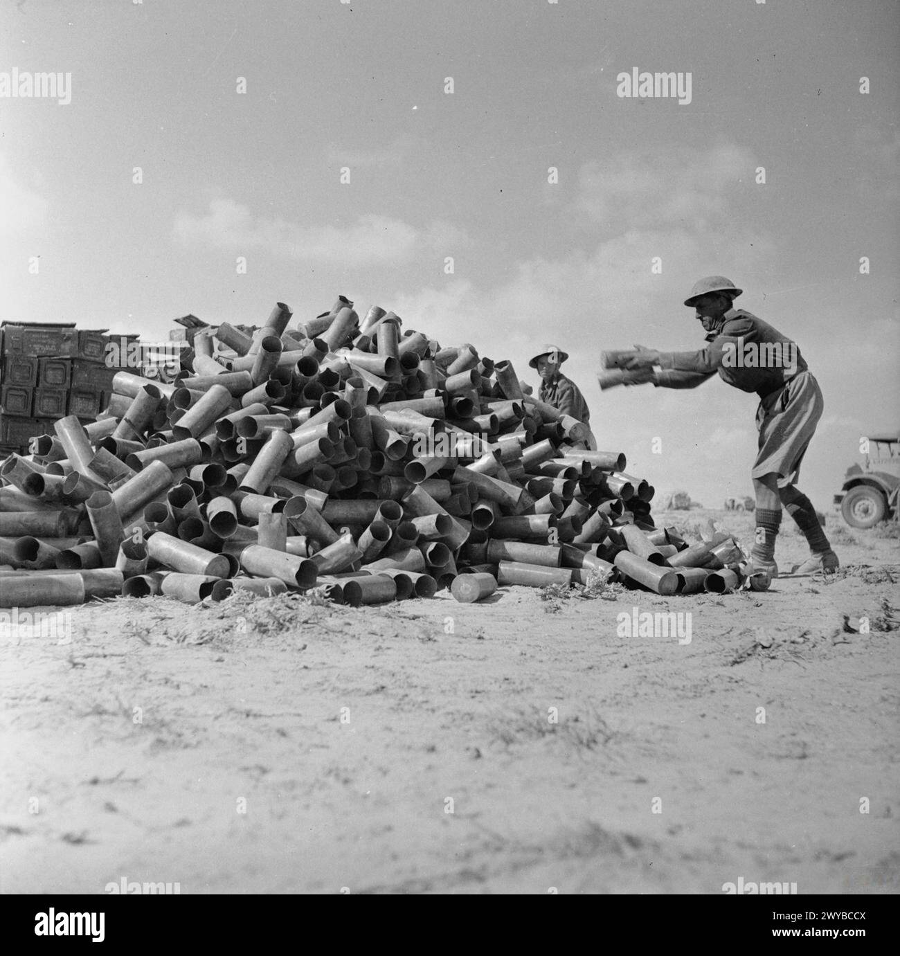 AFTER THE RETREAT BEGAN - A pile of used 25-pounder artillery shell ...