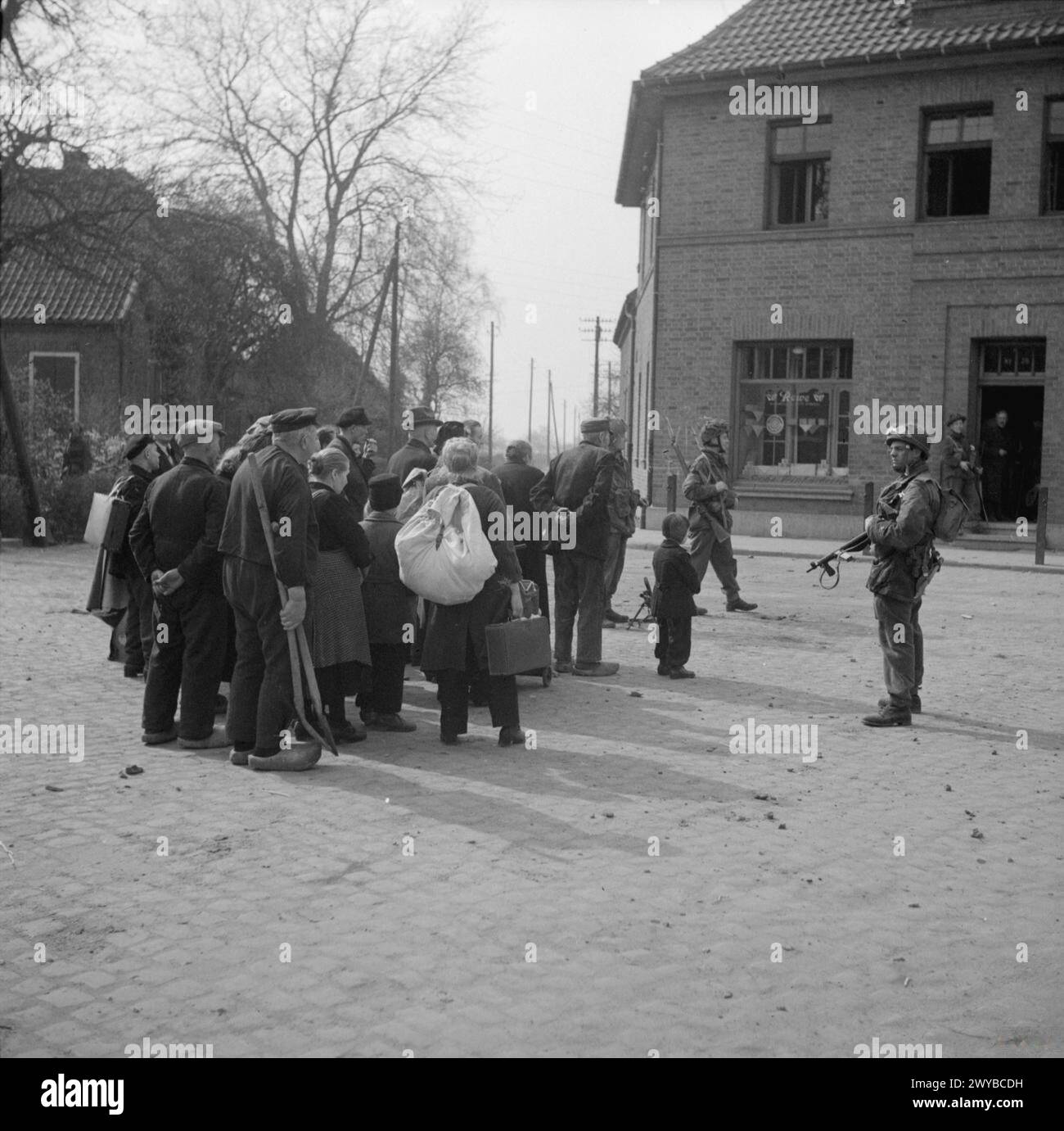 AIRBORNE TROOPS LAND EAST OF THE RHINE - German civilians in Hamminkeln ...