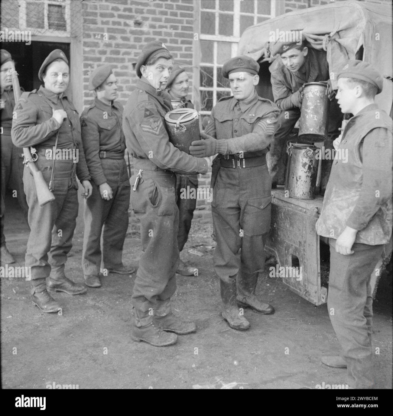 Colour Sergeant Pretty distributing hot food to section carriers of the ...